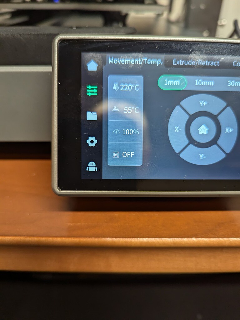 What is this symbol on the screen at the bottom? "M" in a box that's ...